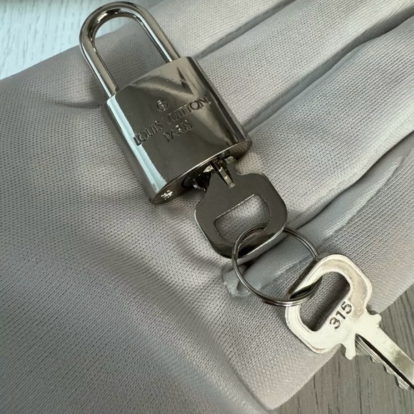 Louis Vuitton | Accessories | Louis Vuitton Silver Lock 35 | Poshmark